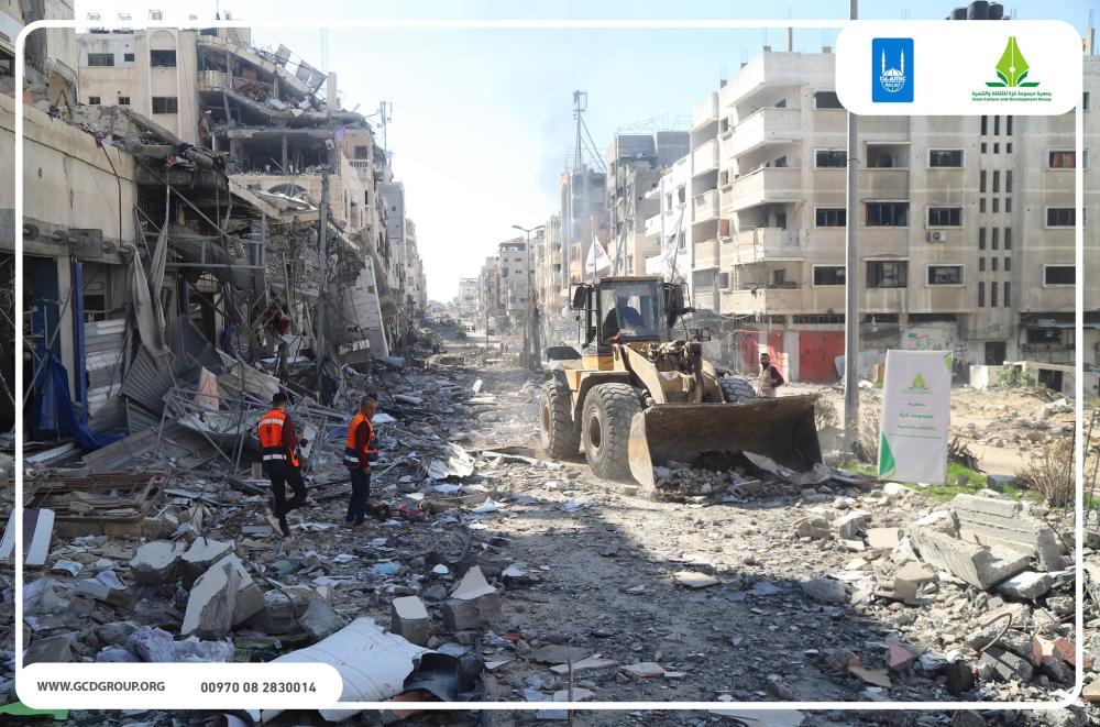 Removing rubble and paving main and vital roads to facilitate traffic